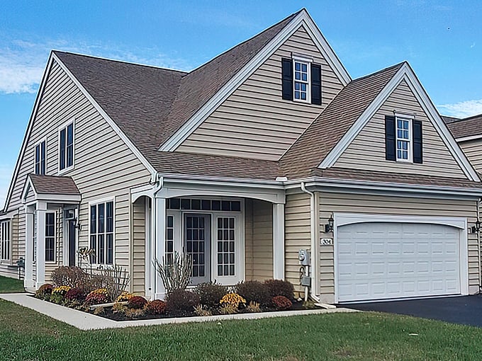 Cape Cod styling meets modern convenience in this Spring Meadow home where "climbing the corporate ladder" is replaced by "relaxing on the front porch."
