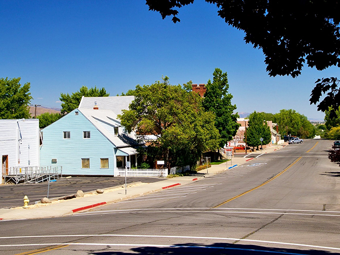 Tree-lined streets and modest homes create the kind of neighborhood where everyone waves and nobody needs a second mortgage.