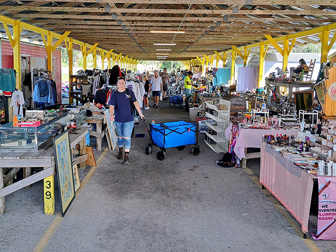 Yellow canopies create shopping lanes where every step might lead to your next favorite find.