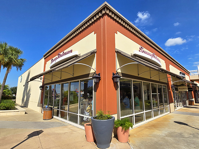 Those colorful storefronts create a shopping rainbow where every pot of gold contains discounted designer goods and happy wallets.