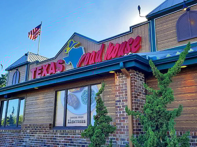 The American flag flies proudly outside Texas Roadhouse, where peanut shells and country music set the down-home tone.