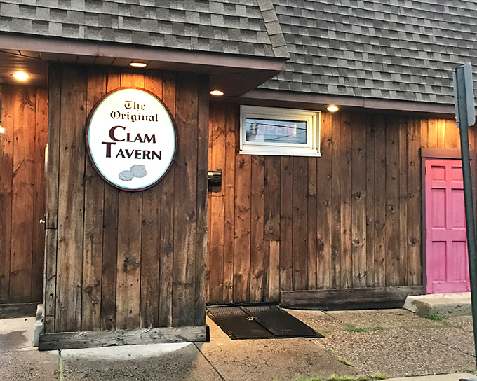 Wooden exterior with a sign that says, 'Yes, we're serious about clams.' The kind of place where calories don't count and seafood reigns supreme.