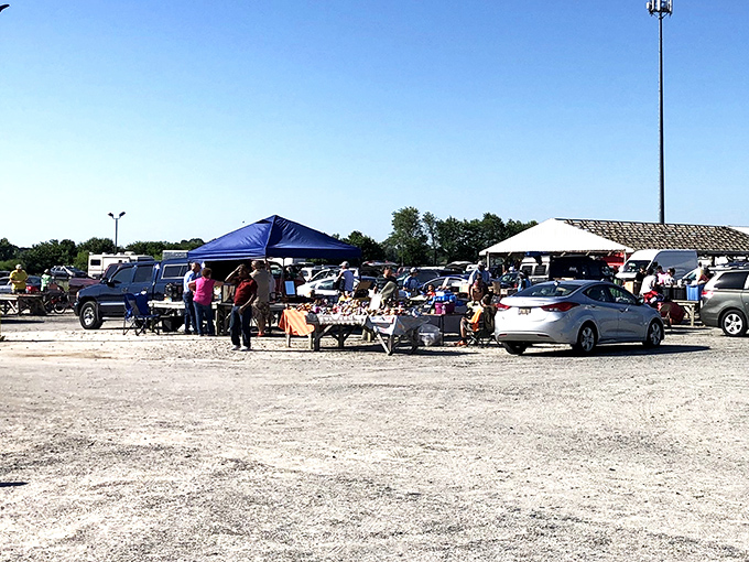 Trailers and tents transform ordinary gravel lots into weekend wonderlands for bargain seekers everywhere.