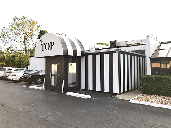 Sometimes the most distinctive exteriors house the most memorable meals, and this striped beauty delivers on both promises completely.