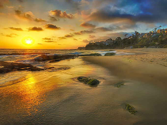 Golden hour at Thousand Steps Beach turns the water into liquid amber. Worth every single step down.