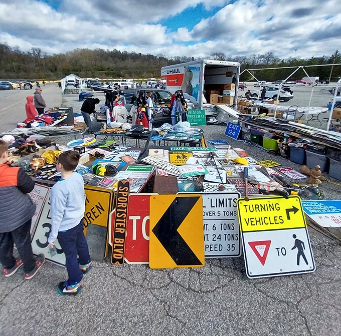 Cars become mobile storefronts in this automotive bazaar where every trunk holds someone's forgotten treasures.