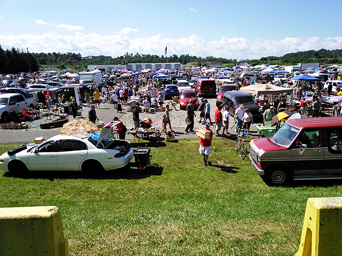 Cars become makeshift storefronts at this massive swap meet where deals flow like the three rivers.