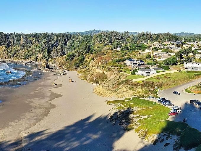 Houses cascade down to the beach like they're racing to dip their toes in the Pacific.