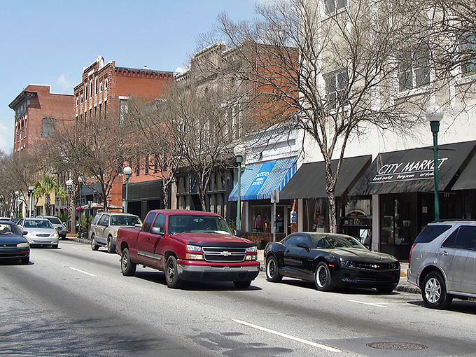 Main Street magic in Valdosta! Where pickup trucks and sports cars share asphalt real estate beneath the watchful gaze of century-old brick storefronts.