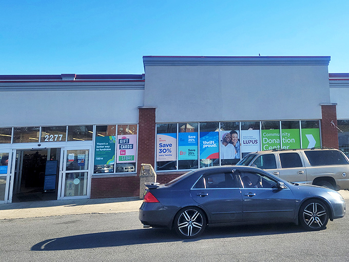 Notice how the storefront practically invites you in with promises of incredible deals waiting just beyond those doors.