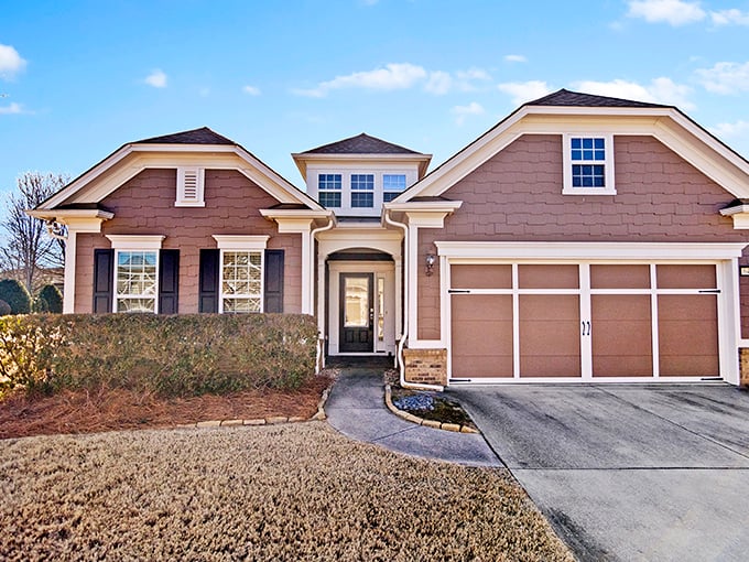This charming ranch-style home could be your next chapter—complete with garage space for the golf cart you've always wanted.