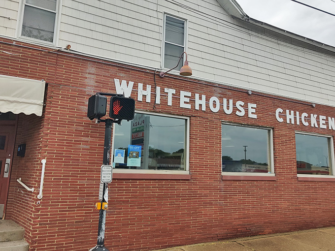 The simple storefront hides culinary magic - where golden chicken dreams come true one crispy bite at a time.