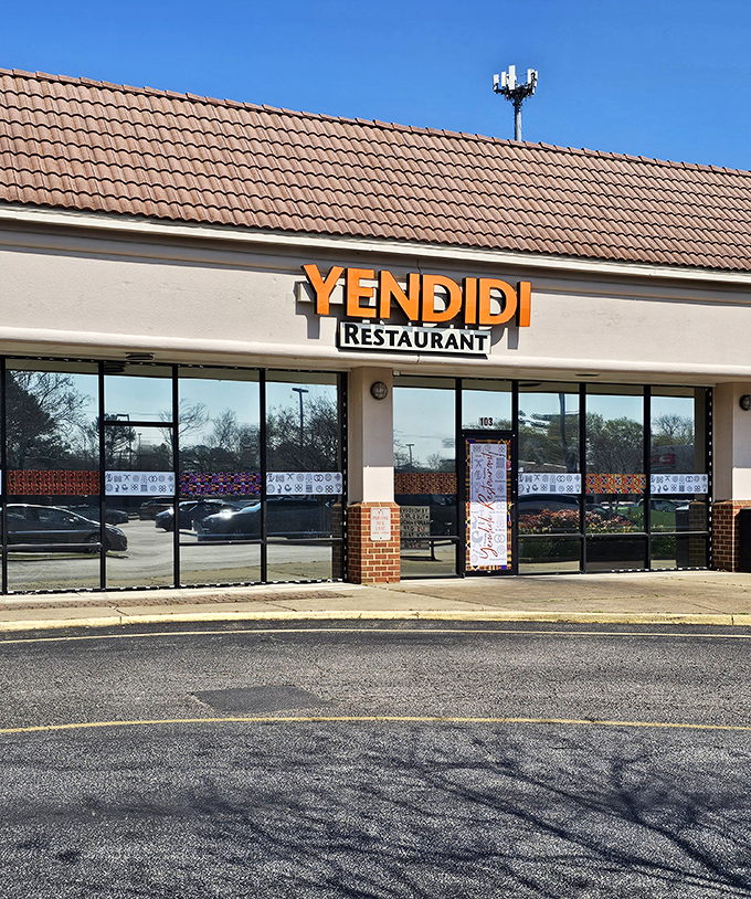 Clean lines and big windows promise fresh flavors and authentic experiences waiting just beyond those doors.