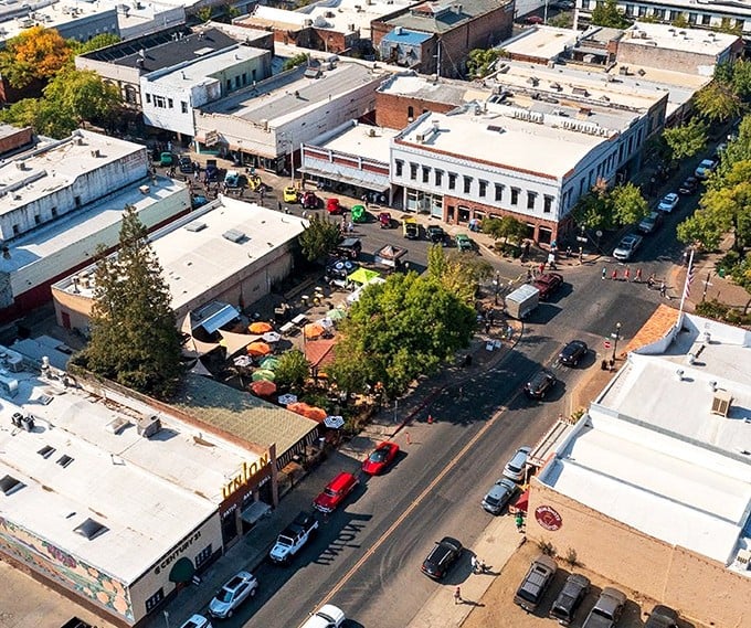 Downtown Oroville from above reveals a community square that's part farmers market, part social club. The kind of place where "running errands" mysteriously takes three hours.