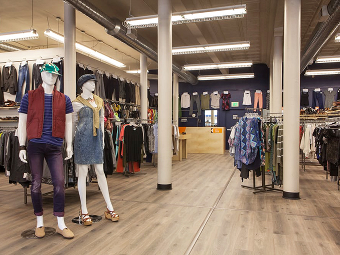 Wide aisles and thoughtful displays make browsing feel like a curated experience rather than a chaotic treasure hunt. The mannequins seem to whisper, "You could look this good too."