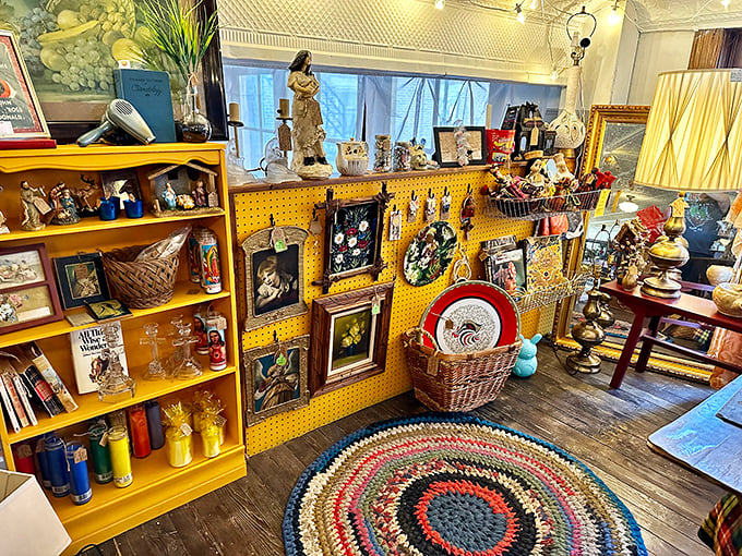 Yellow pegboard becomes a gallery wall for forgotten treasures, that braided rug a portal to grandma's living room circa 1965.