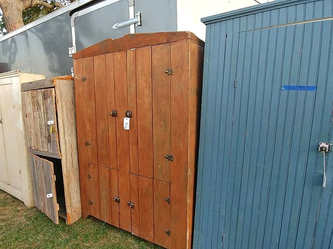 Not just storage solutions but time machines. These weathered wooden cabinets have witnessed decades of family secrets and Sunday best linens.