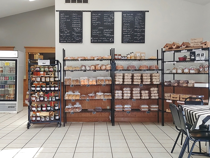 The chalkboard menu and well-stocked shelves tell a delicious story&mdash;each loaf and pastry representing generations of baking expertise.