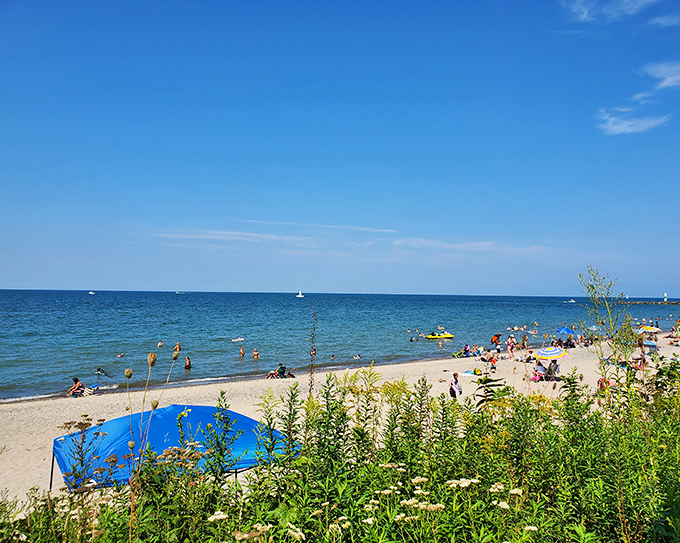 Summer in Ohio isn't official until you've joined the beach brigade at Geneva State Park, where Lake Erie plays host to sun-seekers and sandcastle architects alike.