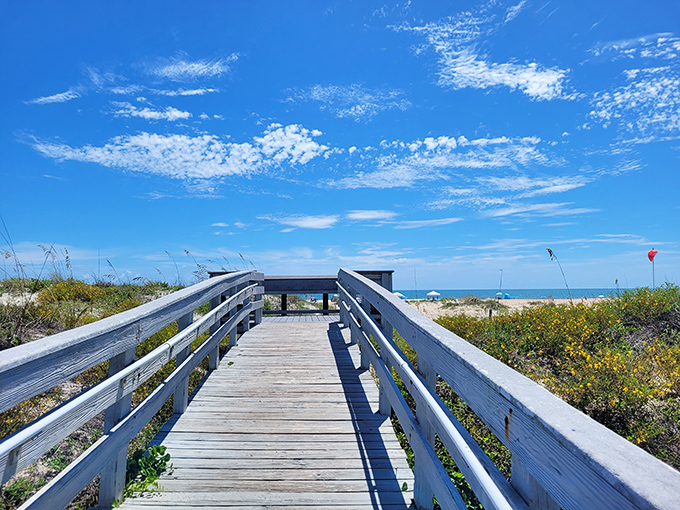 This wooden boardwalk isn't just a path to the beach &ndash; it's the runway for your grand entrance to paradise.