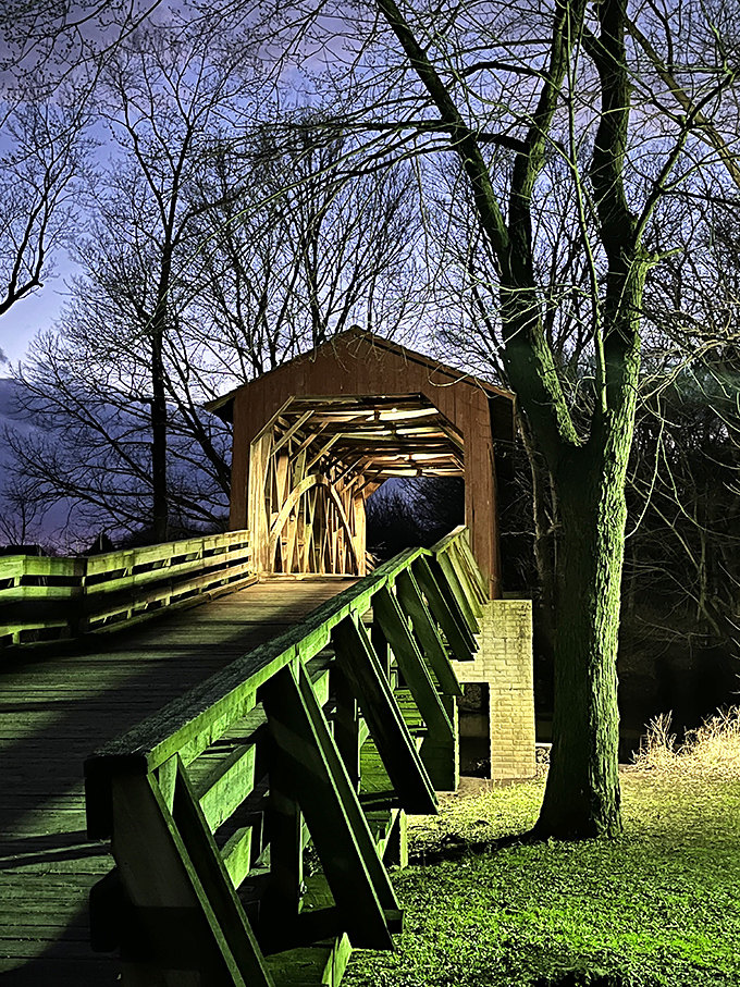 After dark, the bridge transforms into something magical—like stepping into a time portal illuminated by modern technology.