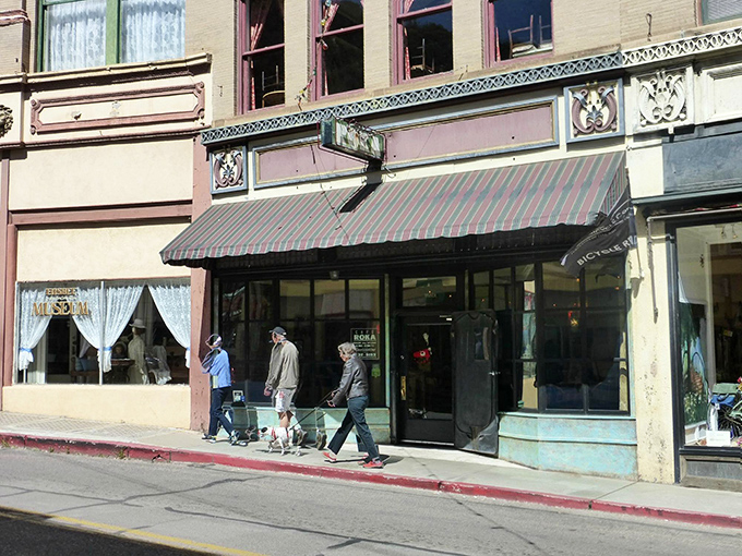 Strolling past Bisbee's historic storefronts feels like walking through a perfectly preserved film set. The striped awnings add a touch of old-world charm.