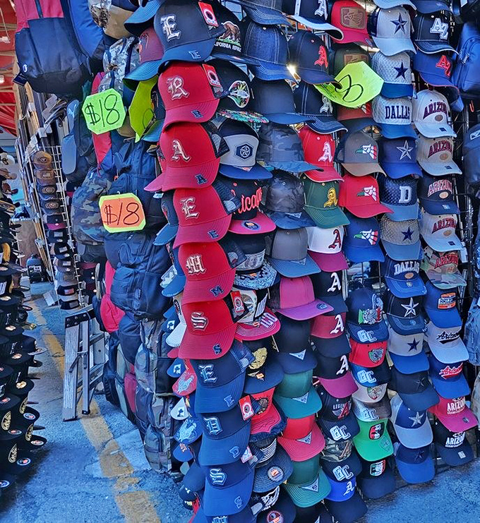 A rainbow wall of caps proves there's literally a lid for every head and personality.