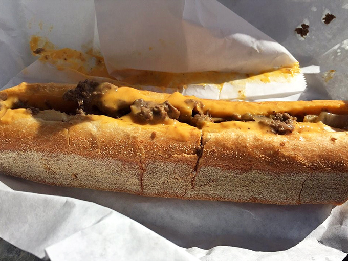 Behold the star of the show &ndash; thinly sliced ribeye and melted cheese on that perfect roll. Poetry in sandwich form.