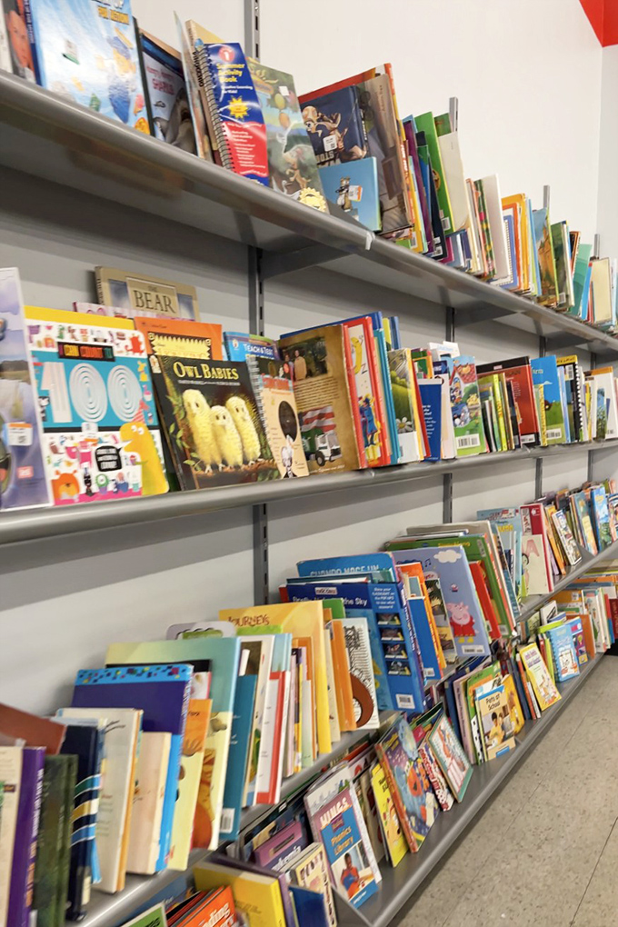 Literary treasures for tiny humans line these shelves, where childhood classics find new homes at piggy-bank-friendly prices.