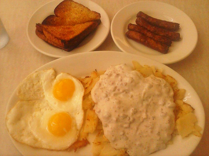 The star of the show: country fried steak smothered in pepper-speckled gravy alongside sunny eggs. This plate doesn't just satisfy hunger&mdash;it solves existential crises.