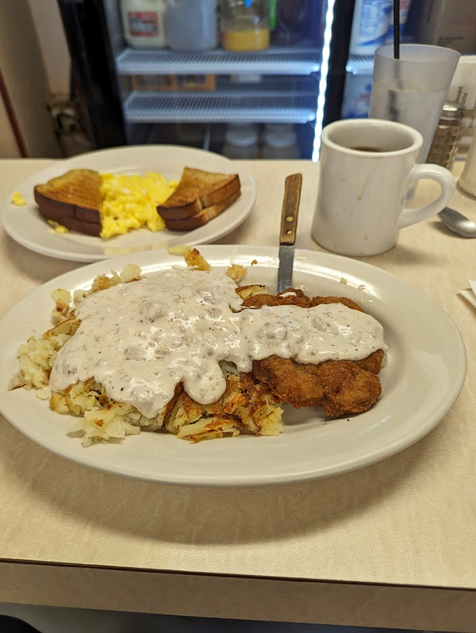 The star of the show: country fried steak smothered in peppery gravy that could make even your most stoic uncle weep with joy.
