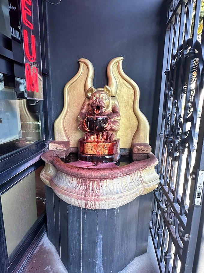 Nothing says "welcome" quite like a blood-red fountain at the entrance. Subtle? No. Effective? Absolutely.