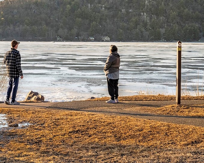 Devil's Lake in winter transforms into a meditative landscape where visitors contemplate nature's quiet beauty, proving Wisconsin's charm extends well beyond summer.