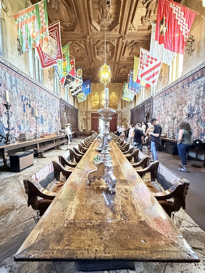 Imagine dining with Hollywood royalty at this impossibly long table. The flags overhead aren't just decoration&mdash;they're conversation starters for when celebrity small talk runs dry.
