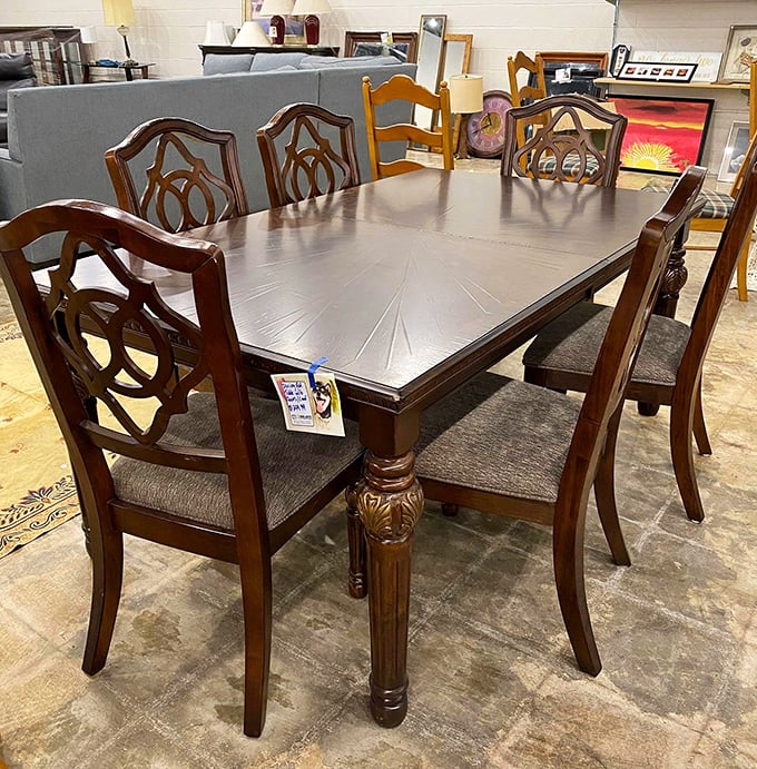 This elegant dining set waits patiently for its next dinner party. At thrift store prices, you can afford to host the feast too!