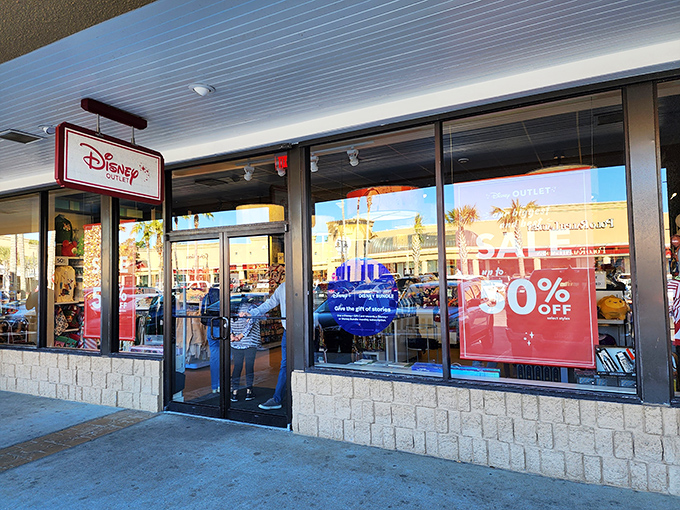 The Disney Store outlet: where adults justify purchases "for the kids" while secretly planning which character mug will join their collection.