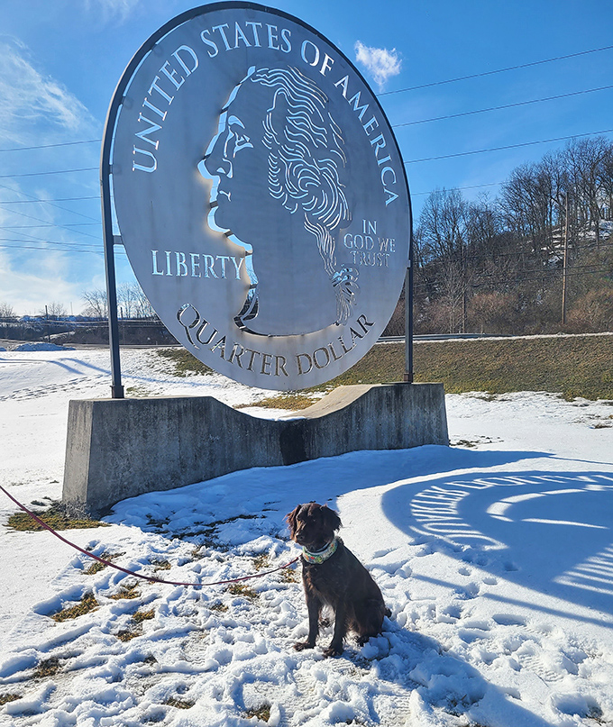 Even four-legged travelers appreciate the magnificence of oversized legal tender. This pup's probably thinking, "That would buy a lot of treats."