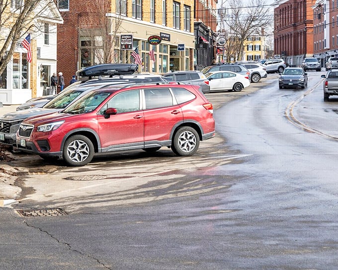 Downtown Exeter's brick-lined streets invite leisurely exploration, where American flags flutter above storefronts that have witnessed centuries of New Hampshire history.