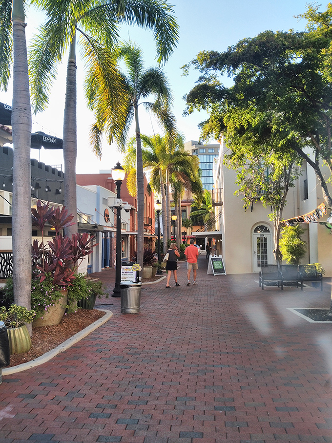 Palm-lined walkways in the River District invite leisurely strolls where window shopping doesn't automatically trigger credit card alerts.