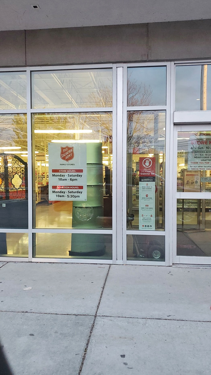 Store hours posted clearly on the entrance doors&mdash;the gateway to what some Chicago bargain hunters consider their happy place.