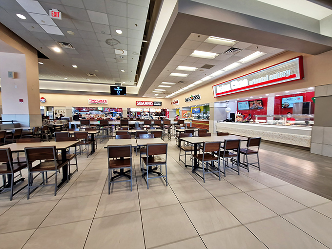 The food court: where shopping marathoners refuel before their second wind of wallet-friendly retail therapy. Sbarro's pizza slices await the weary.