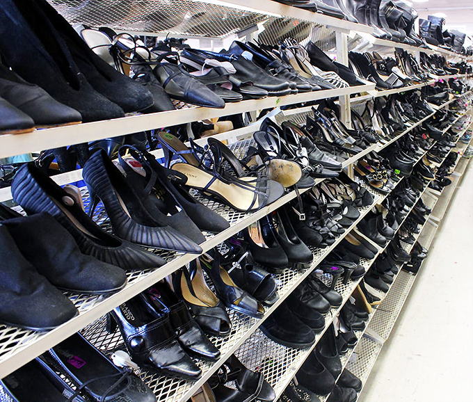 Cinderella had a fairy godmother; you have American Thrift's shoe section. From barely-worn designer heels to practical flats, your next favorite footwear awaits.