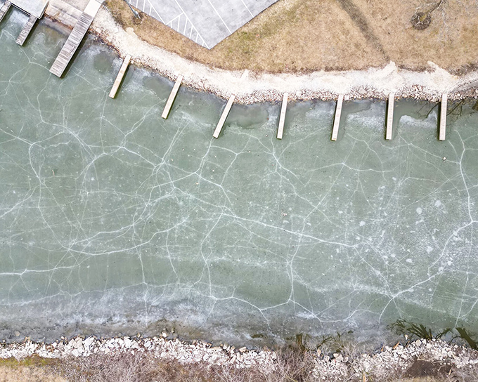 Grand Lake St. Marys freezes into a winter wonderland, creating natural recreation opportunities where summer fishing spots transform into impromptu ice skating rinks.