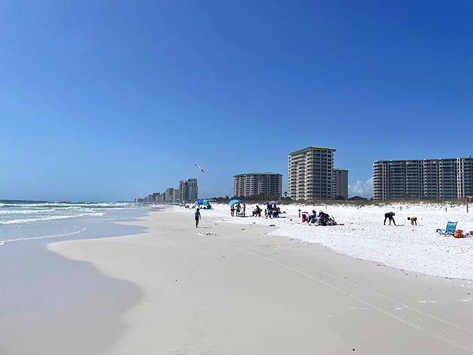 The beach stretches like nature's welcome mat alongside high-rises&mdash;a perfect illustration of Florida's delicate balance between preservation and development.