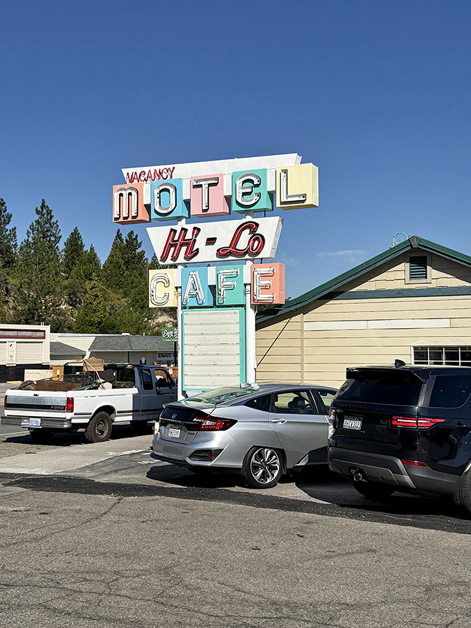 The Hi-Lo Cafe's vintage neon sign promises what every road trip needs: hearty comfort food served with a side of nostalgia.