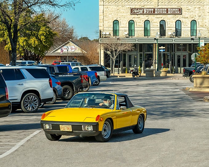 The historic Nutt House Hotel welcomes visitors with old-world charm and a bright yellow sports car that clearly didn't get the "everything was simpler back then" memo.
