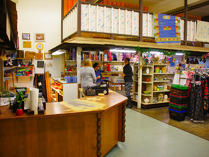 The heart of operations &ndash; a beautifully worn wooden counter where thousands of transactions have turned someone's discards into another's discoveries.