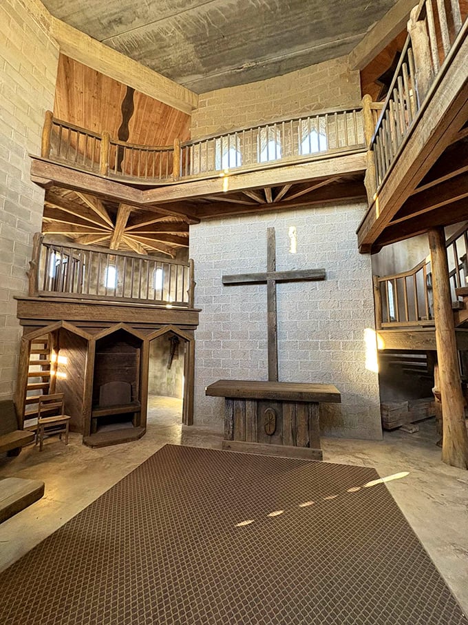 Inside, medieval meets meditation as wooden balconies and stone walls create a sanctuary that whispers rather than shouts its purpose.
