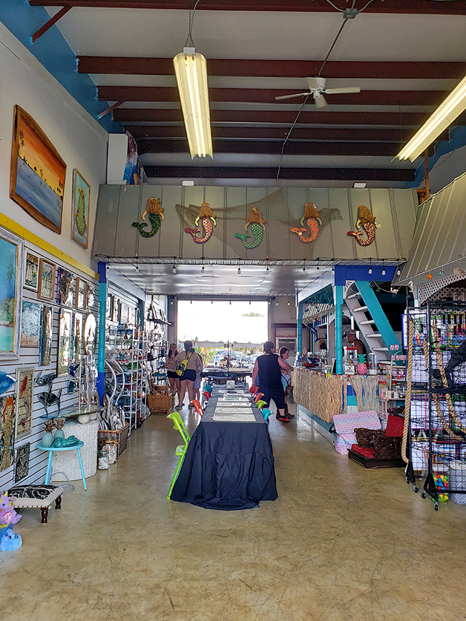 Mermaids watch over shoppers in this nautical-themed corridor, where coastal treasures and Florida kitsch create the perfect treasure hunting atmosphere.