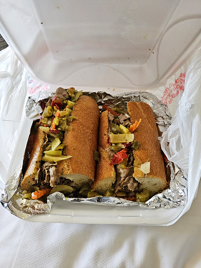 Behold the Italian beef in all its glory—thinly sliced, perfectly seasoned, and topped with that magical giardiniera. Worth every napkin.